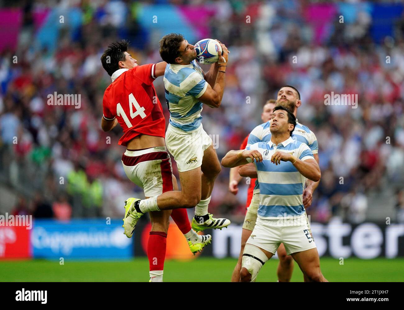 Argentina's Juan Cruz Mallia catches the ball under pressure from Wales ...