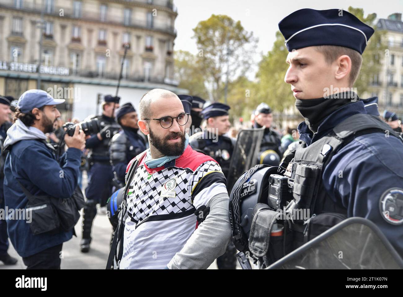 Paris, France. 14th Oct, 2023. Riot police arrest a protester during a ...