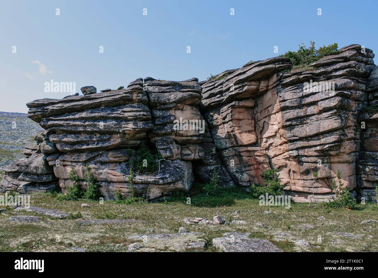 Low syenite rock igneous mountain formation. cooled layers of magma ...