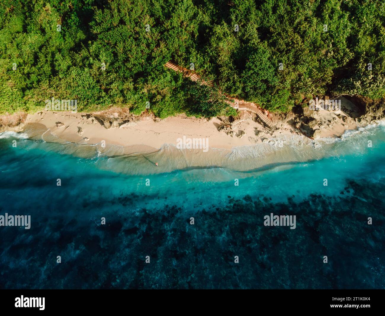 Tropical beach with tropical ocean in Bali. Aerial view of Green bowl ...