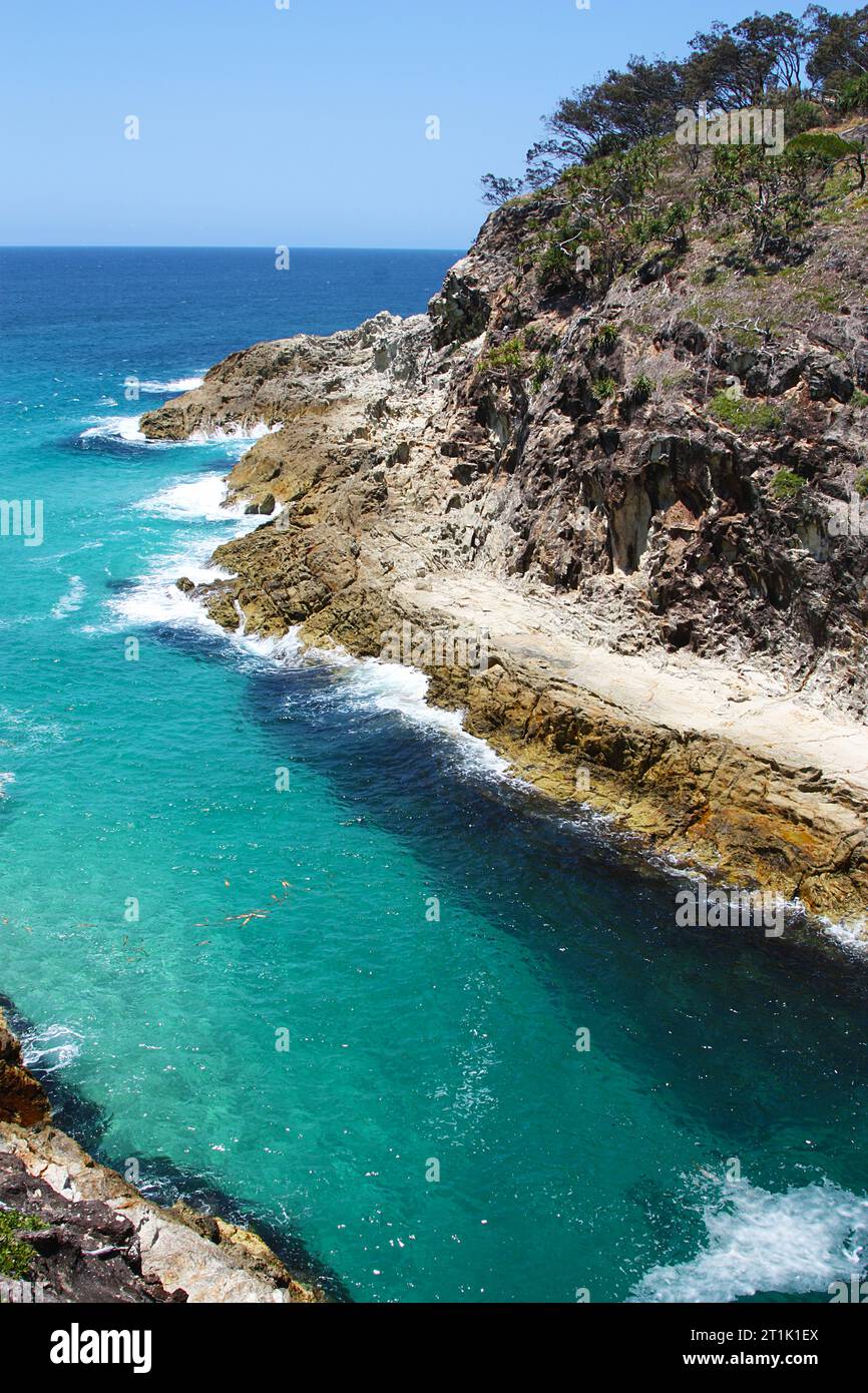 A vertical of Headland Gorge on Stradbroke Island against the sea in ...