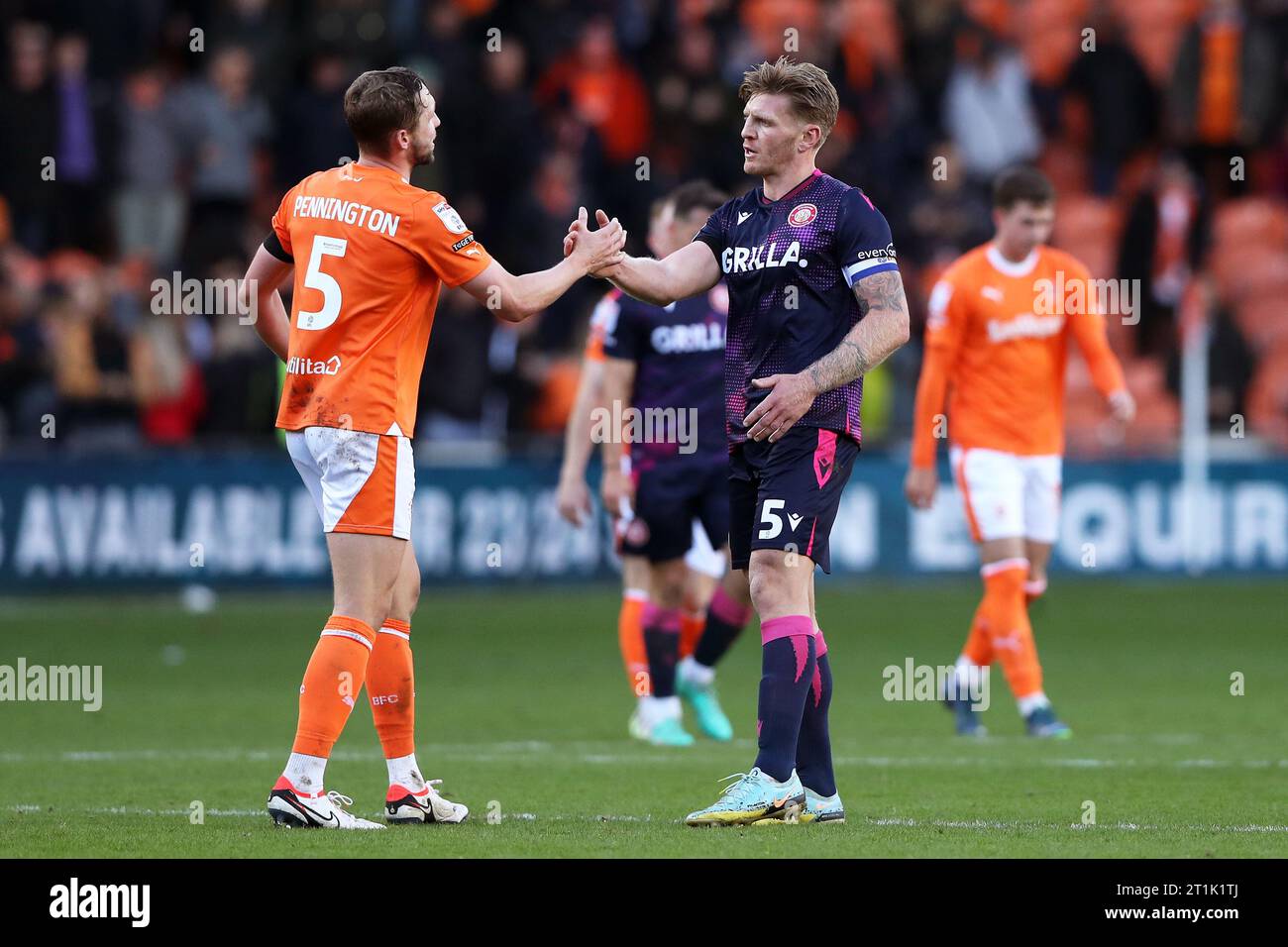 Matthew Pennington (left) and Carl Piergianni shakes hands after the ...