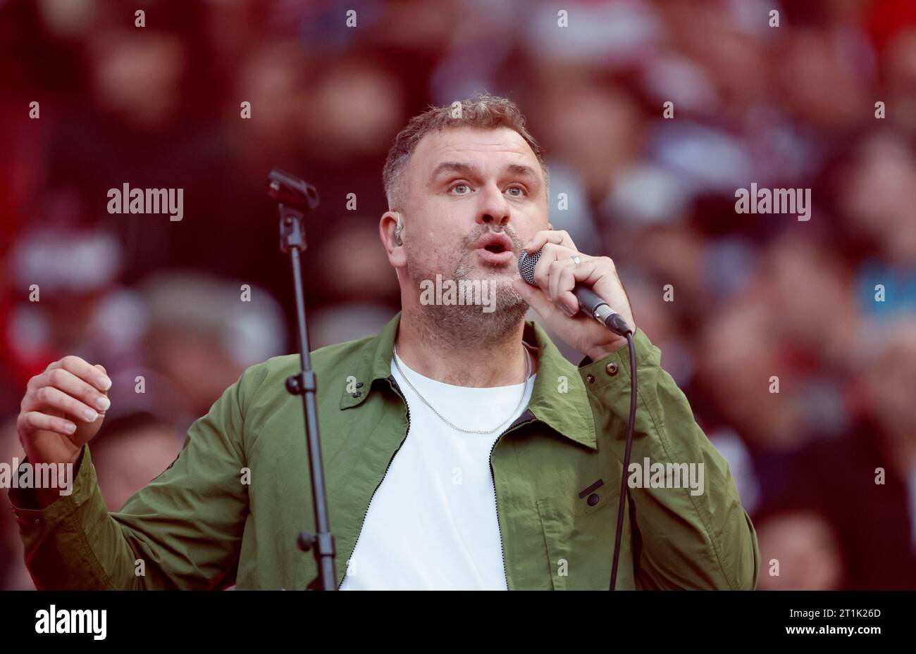 Jon McClure of Reverend and The Makers performs prior to the Betfred Super League final match at ...