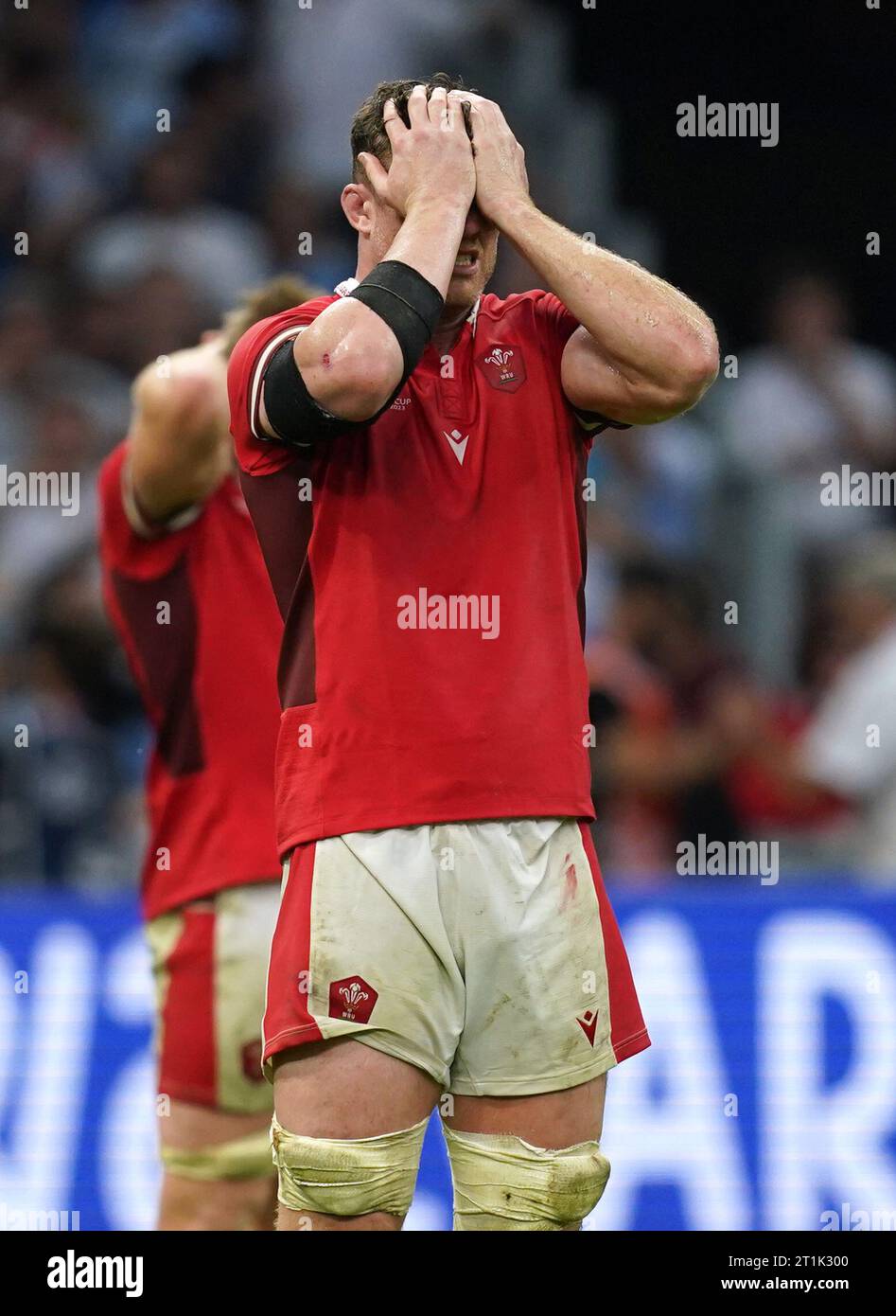 Wales' Will Rowlands looks dejected as he places his hands on his head ...