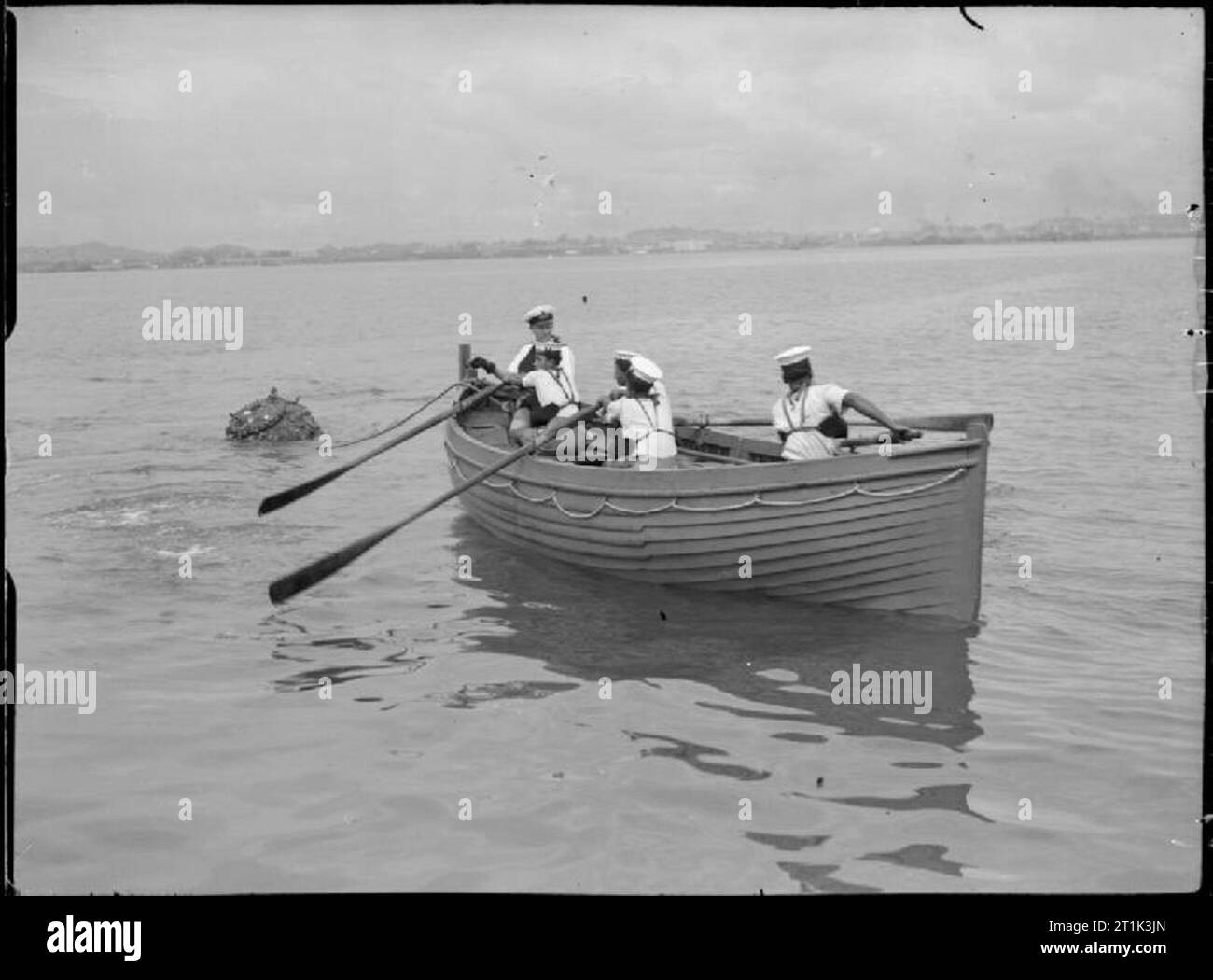 The Royal Navy during the Second World War A floating mine is being ...