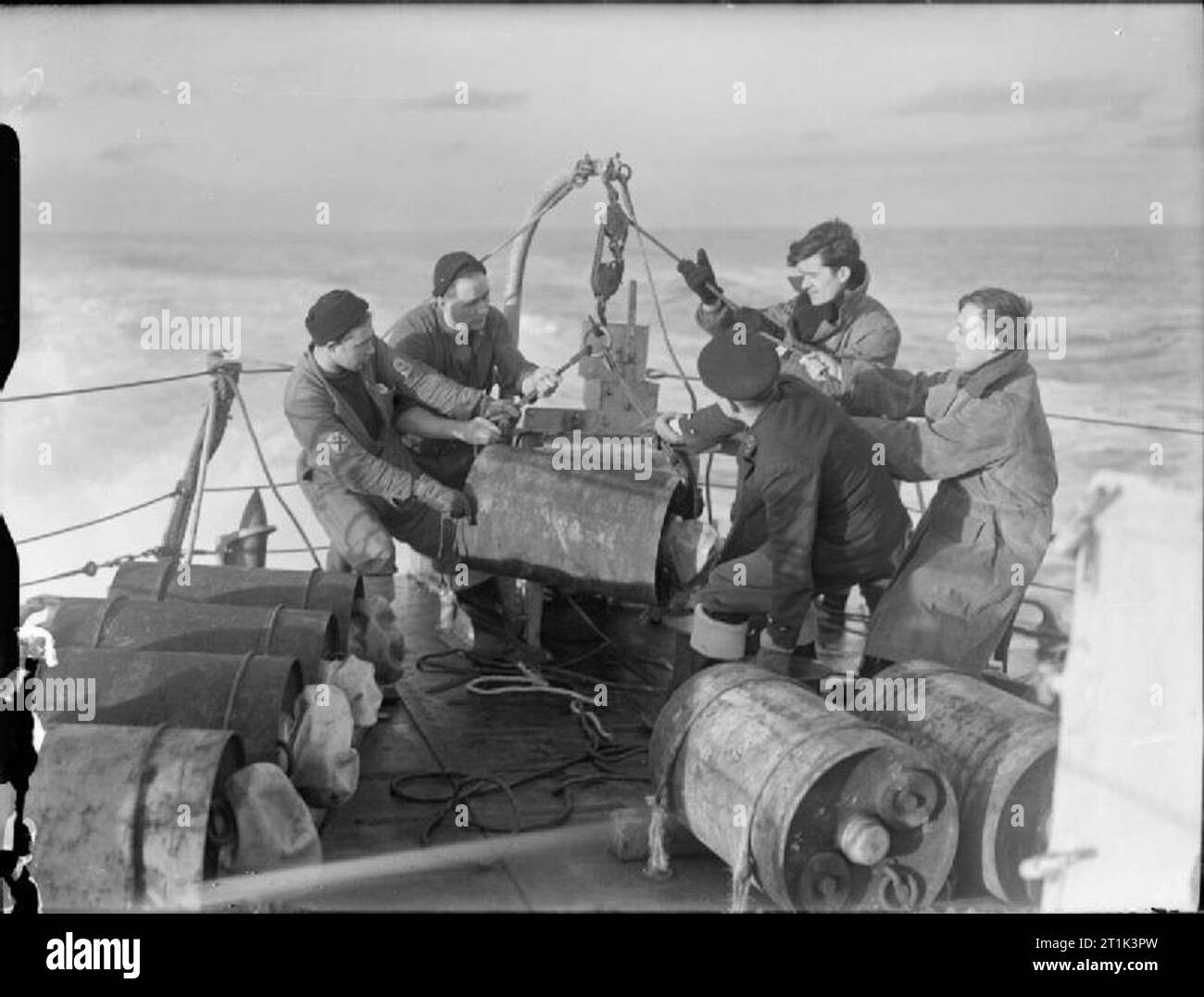 The Royal Navy during the Second World War Sailors placing a depth ...