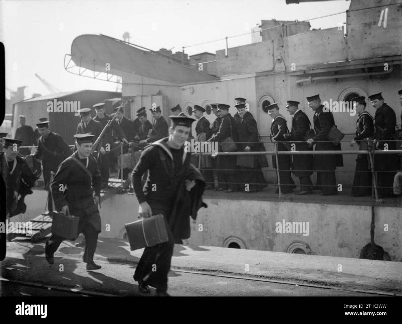 The Royal Navy during the Second World War Carrying small suitcases and ...