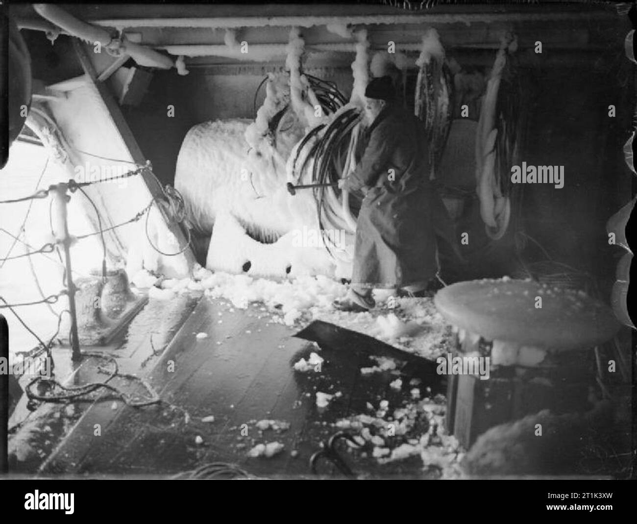 The Royal Navy during the Second World War A member of crew cleaning up ...