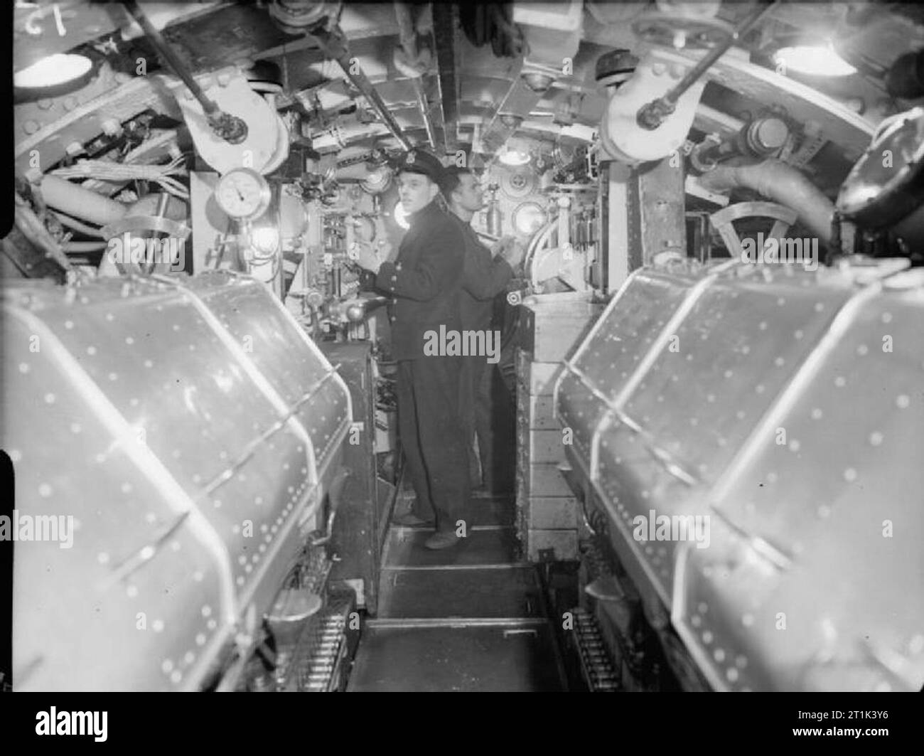The Royal Navy during the Second World War Two men in the engine room ...