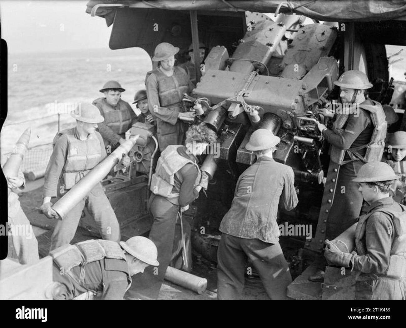The Royal Navy during the Second World War Men loading the 4 inch high ...