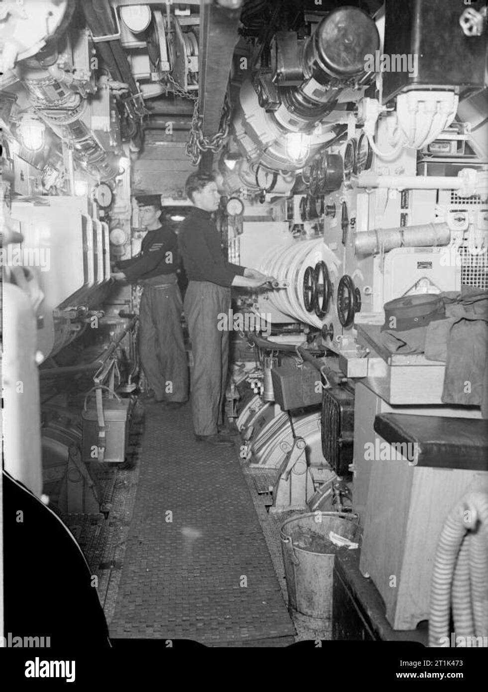The Royal Navy during the Second World War Two men in the main motor ...