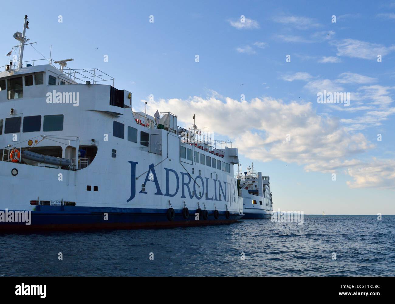 Zadar, Croatia - January 2015: Passenger and car ferry ships docked at ...