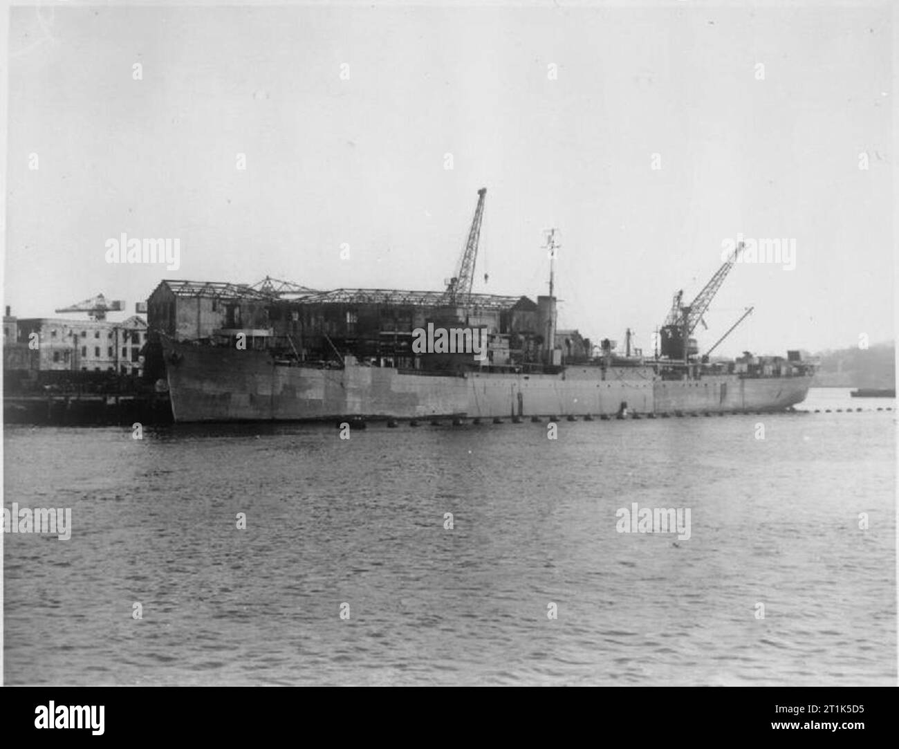 HMS Marsdale At a jetty with boom defence Stock Photo - Alamy