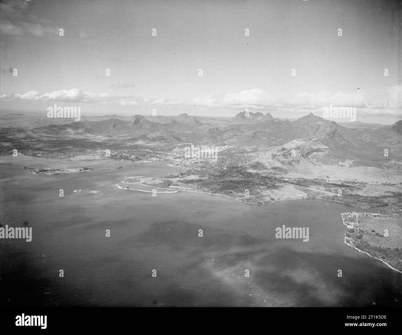 HMS Mauritius, a Fiji Class Cruiser at Sea. August 1942. An aeriel view ...