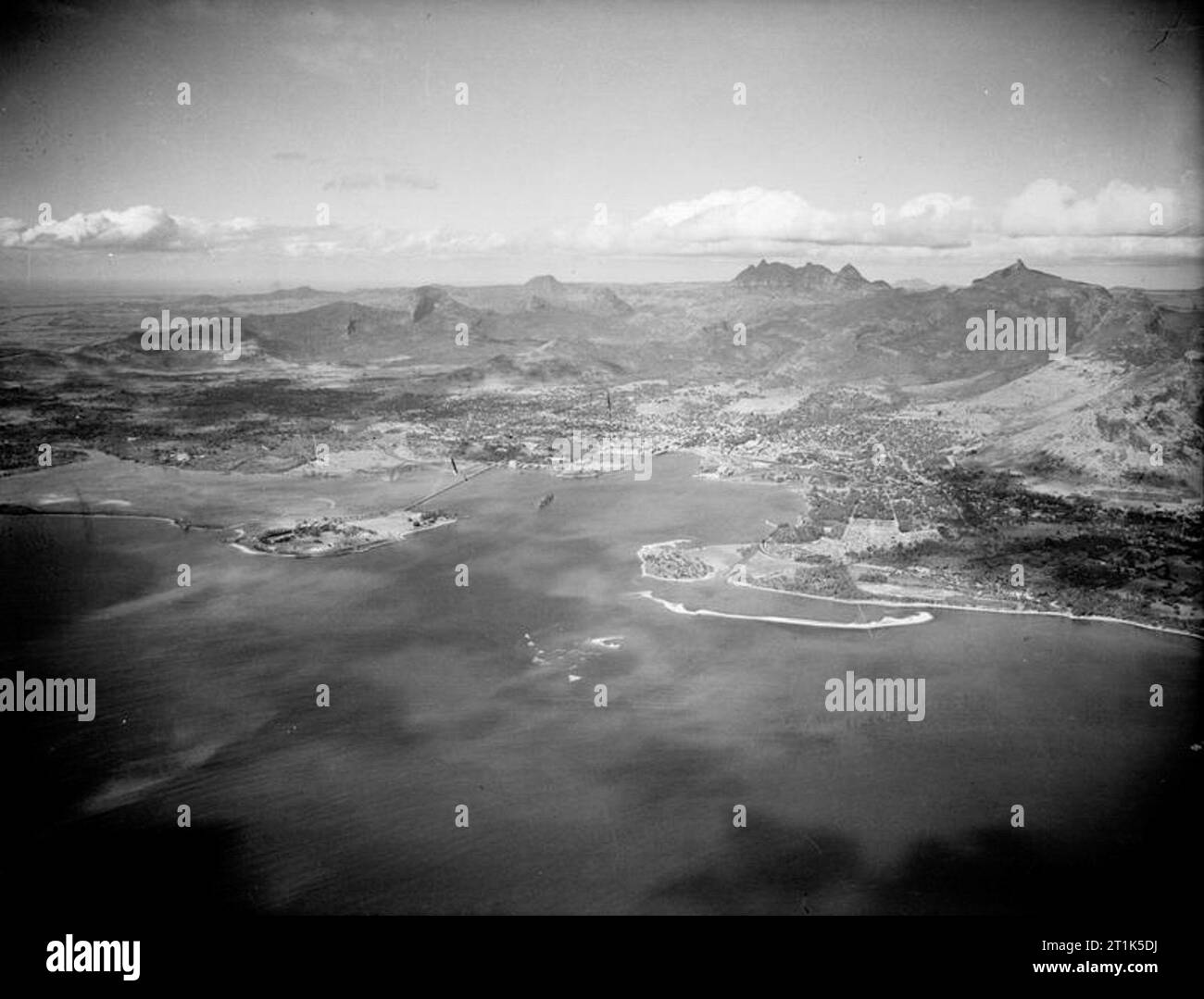 HMS Mauritius, a Fiji Class Cruiser at Sea. August 1942. An aeriel view ...