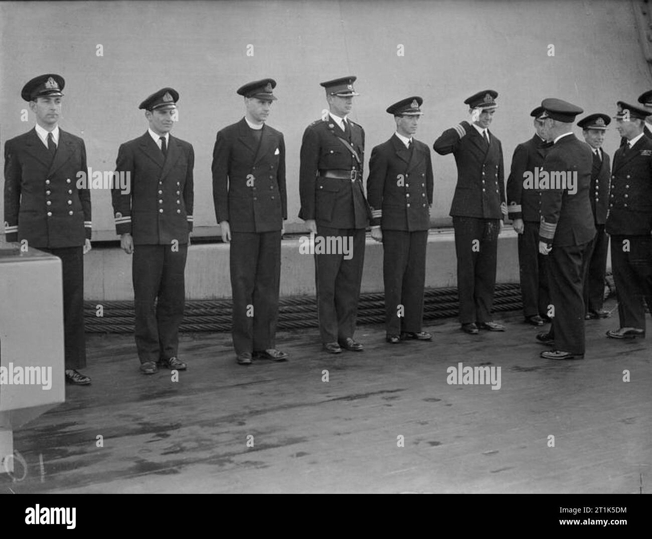 HMS Howe. August 1942. Officers of HMS HOWE being introduced to the C ...