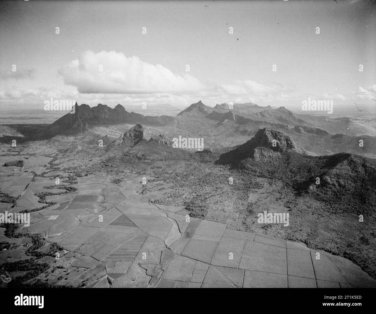 HMS Mauritius, a Fiji Class Cruiser at Sea. August 1942. An aeriel view ...