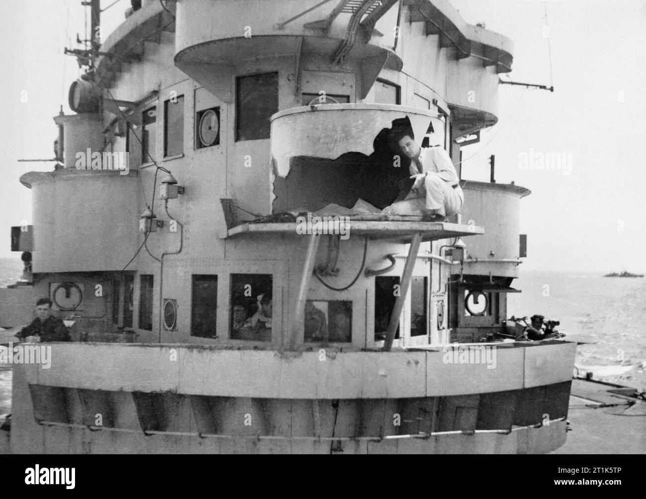 Kamikaze Attacks on Shipping: Inspecting damage to the bridge of HMS ILLUSTRIOUS caused by a ...