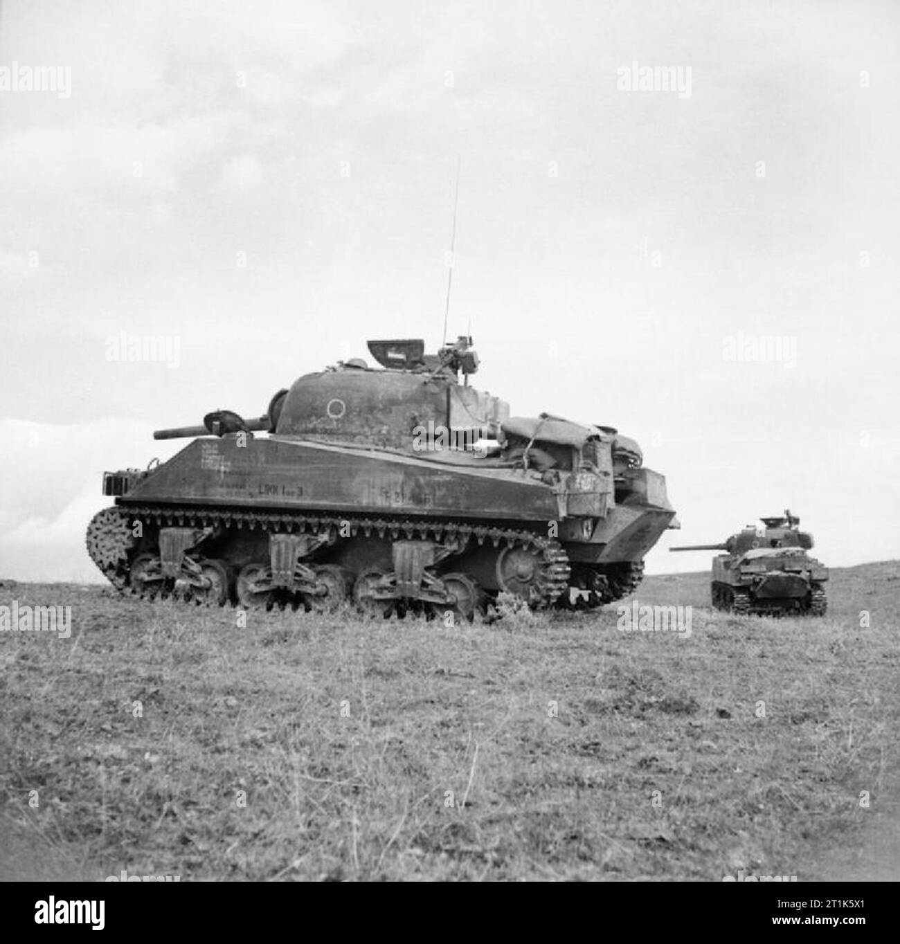Sherman tanks of 46th Royal Tank Regiment provide fire support for the ...