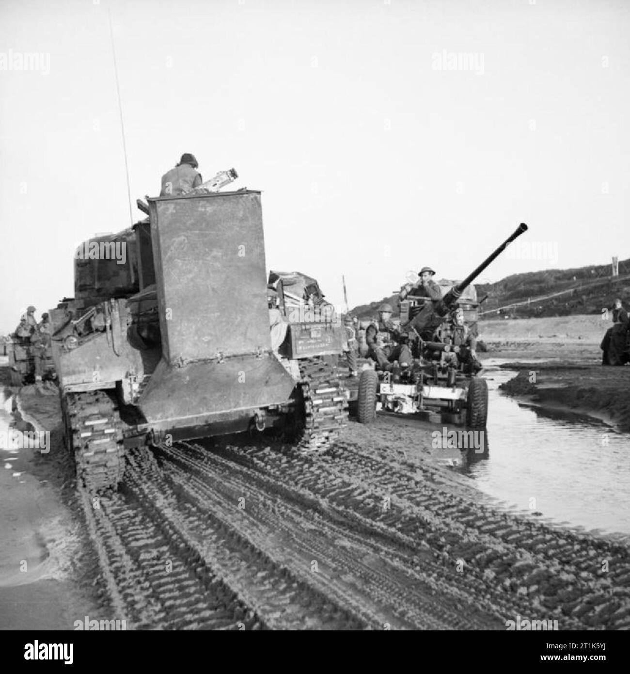 Sherman tanks of 23rd Armoured Brigade and a 40mm Bofors anti-aircraft ...
