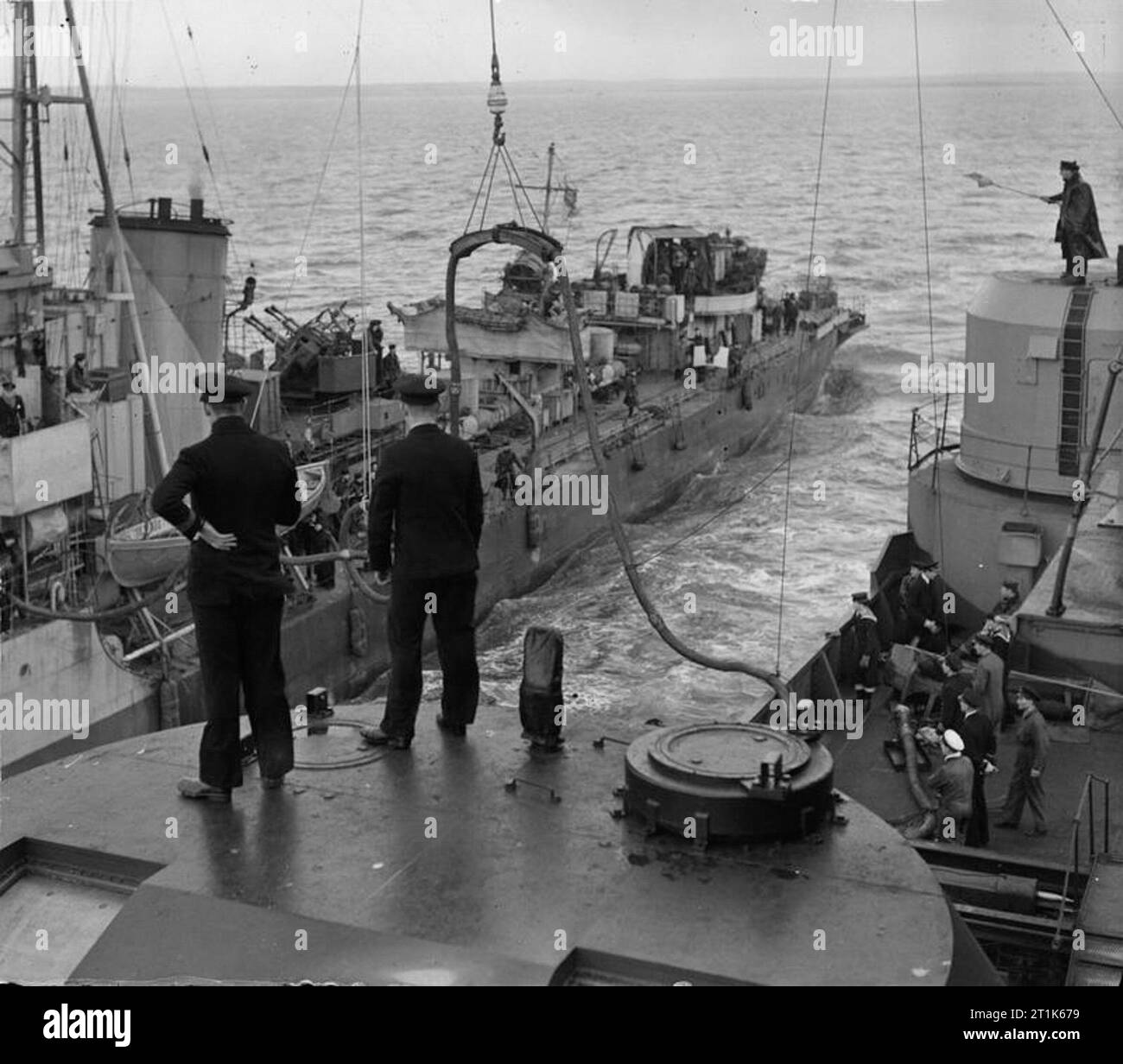 Navy Operation- British Battleship Refuels Destroyer at Sea. 6 February ...