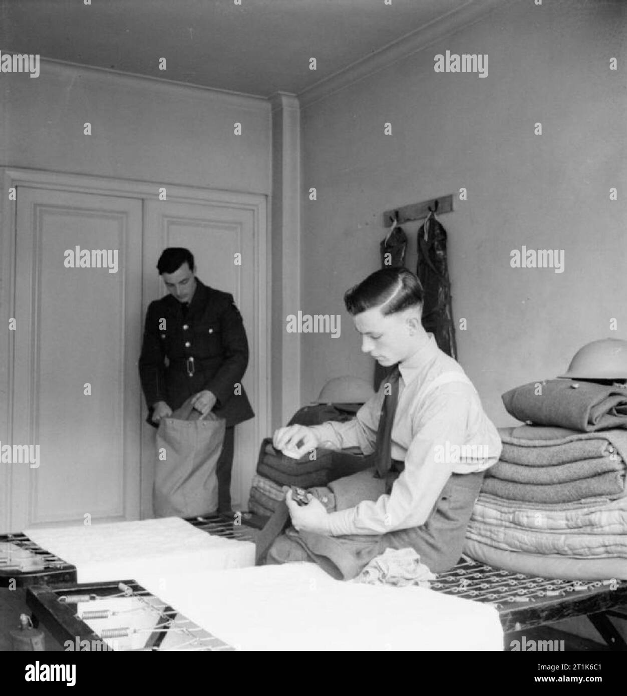 A Recruit Joins the Royal Air Force In his dormitory, in a commandeered ...