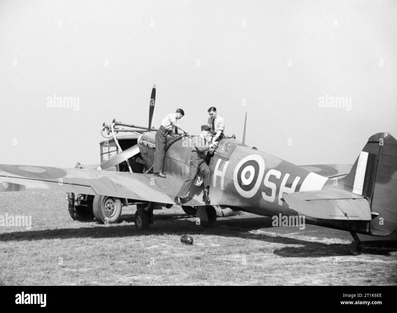Ground staff refuel a Supermarine Spitfire Mk VB of No. 64 Squadron RAF ...