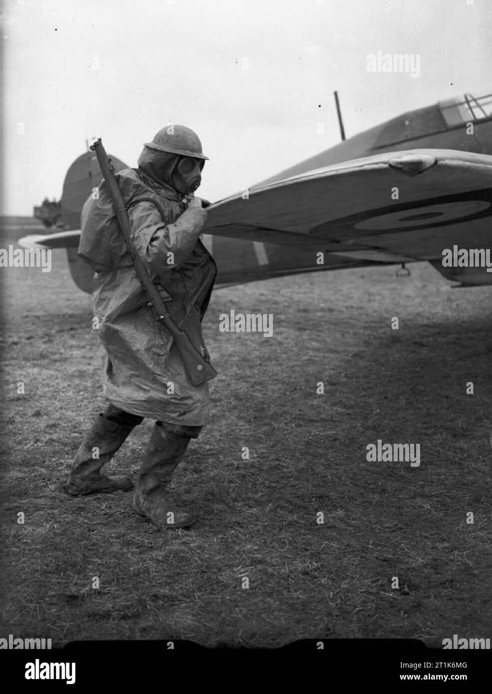 Royal Air Force- France, 1939-1940. An airman, wearing gas clothing and ...