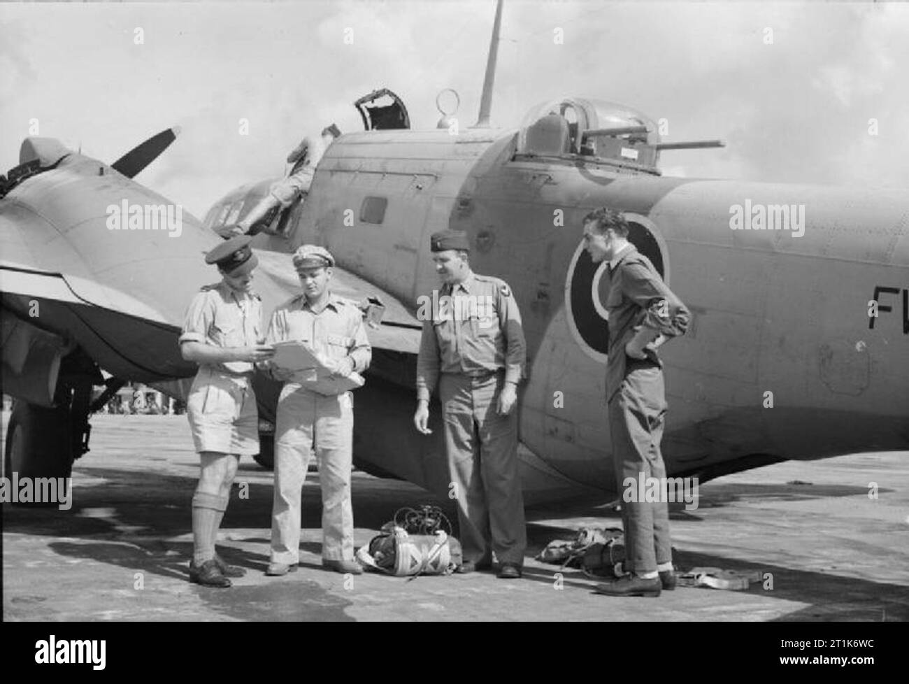 Royal Air Force Transport Command, 1943-1945. A USAAF ferry crew hand ...