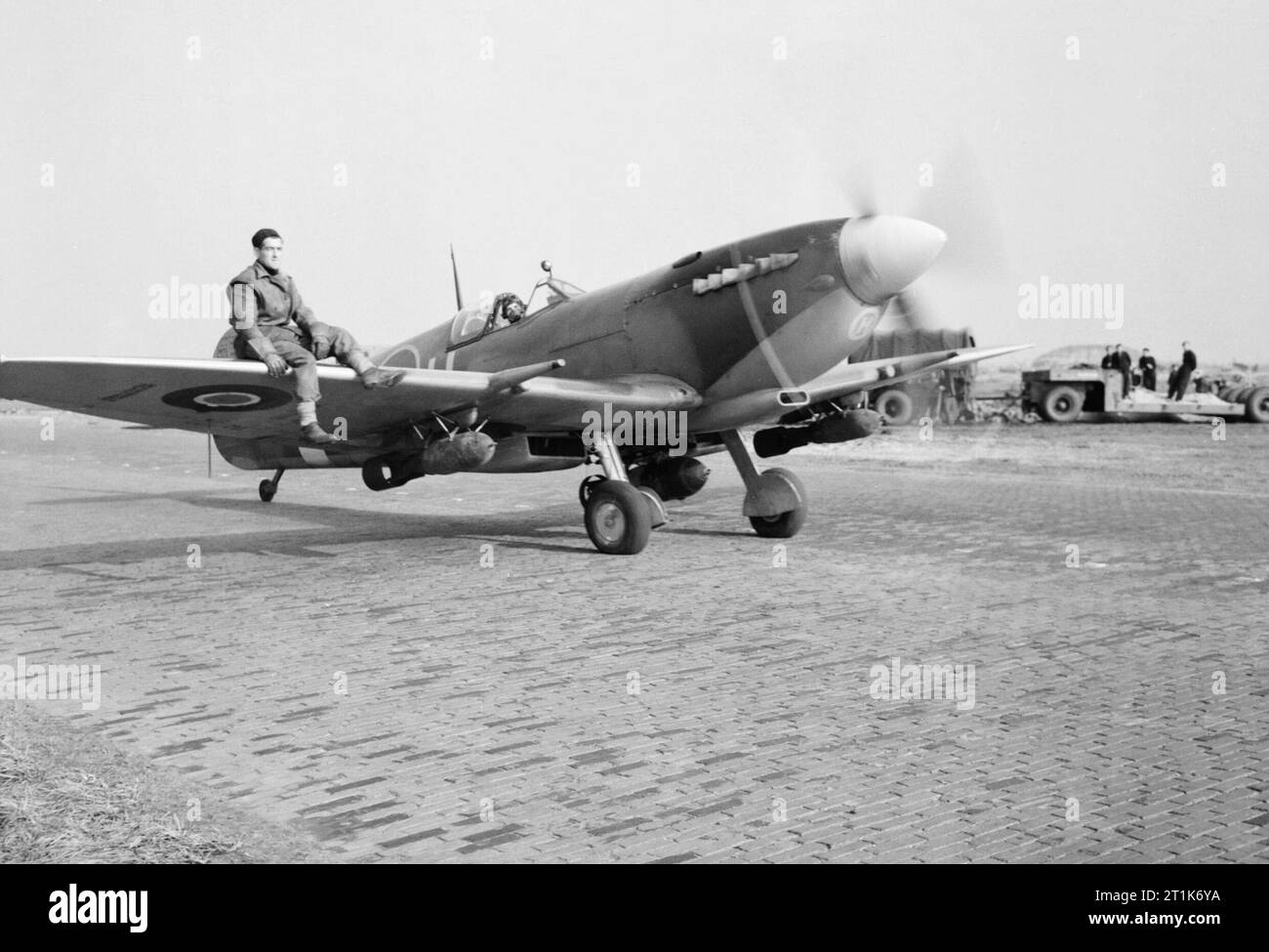 A Supermarine Spitfire Mk IXE of No. 412 Squadron RCAF, armed with a ...