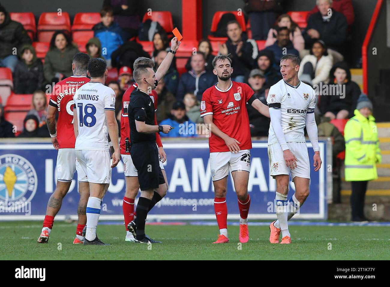 Crewe, UK. 14th Oct, 2023. Tom Davies of Tranmere Rovers (r) is sent ...