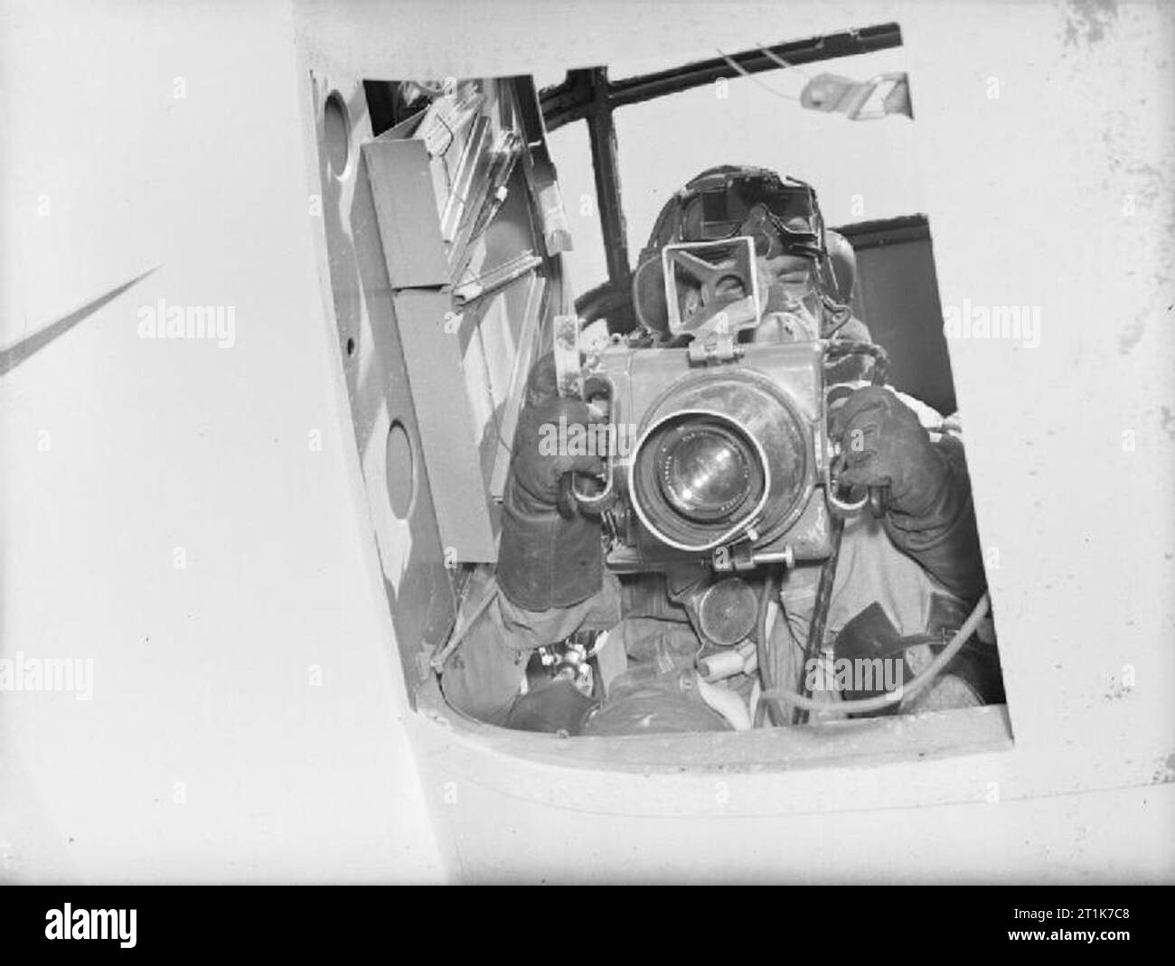 Aerial Photography during the Second World War Bomb-aimer holding an ...