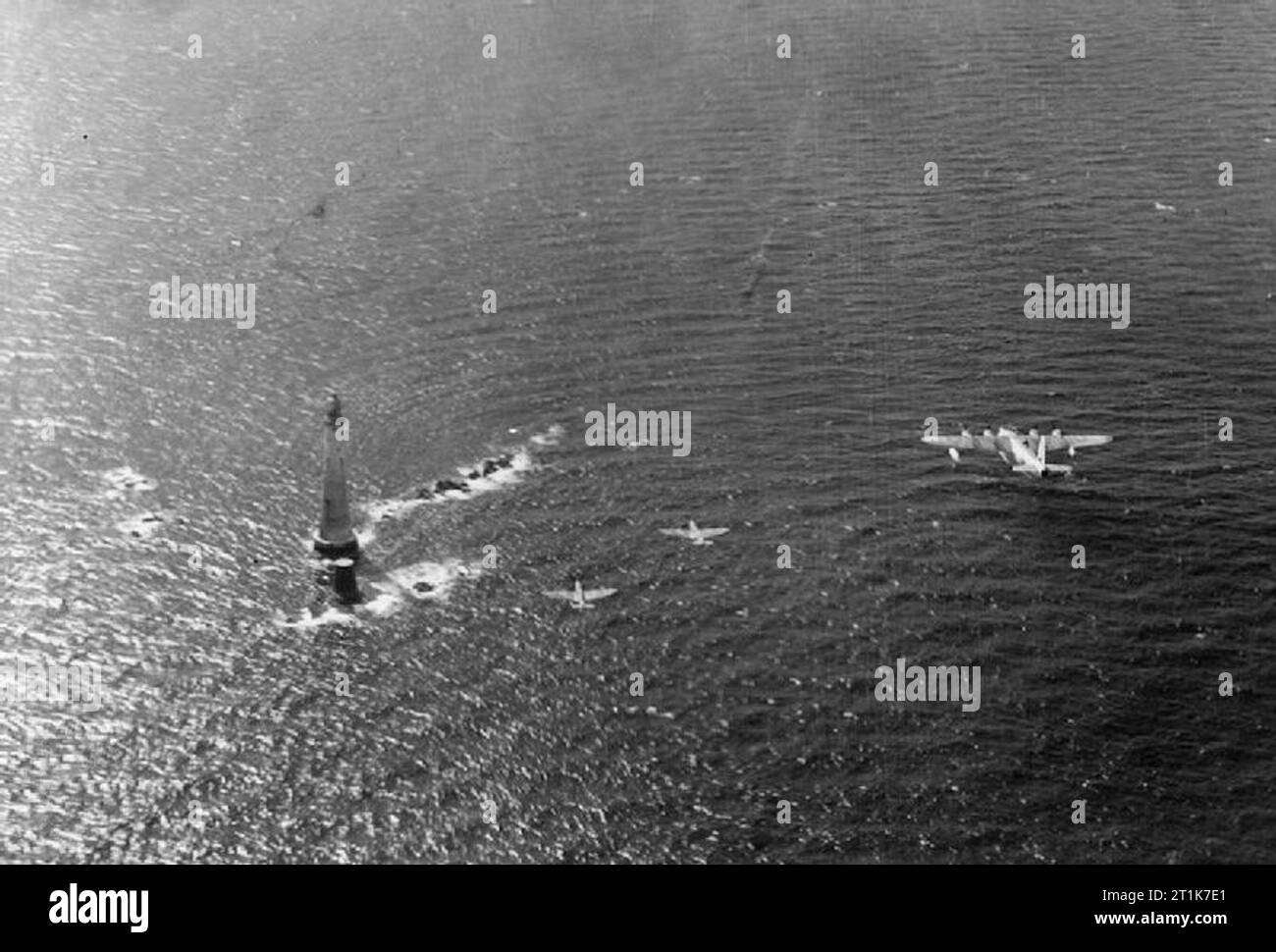 Royal Air Force 1939-1945- Coastal Command A Sunderland and its Spitfire escort passing the ...