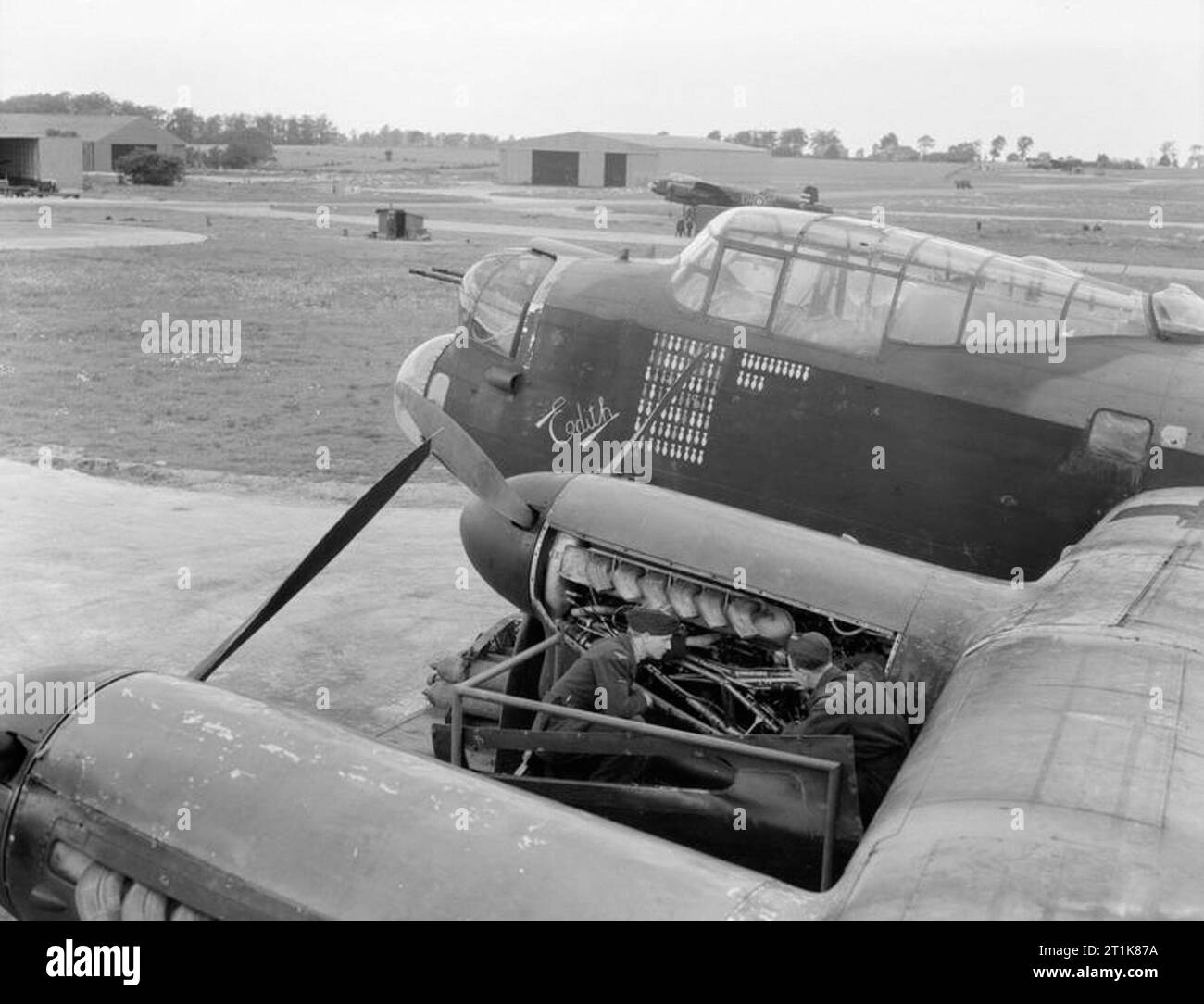 Royal Air Force Bomber Command, 1942-1945. Mechanics at work on an engine of Avro Lancaster B ...