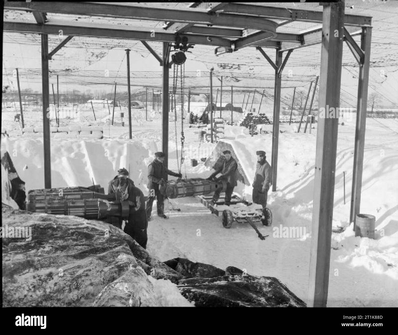 Royal Air Force Bomber Command, 1942-1945. Armourers loading 500-lb ...