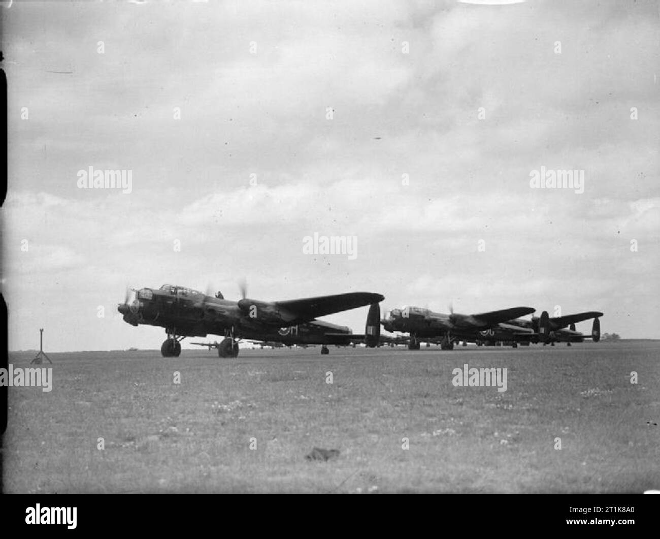 Royal Air Force Bomber Command, 1942-1945. A queue of Avro Lancaster B Mark Is of No. 83 ...