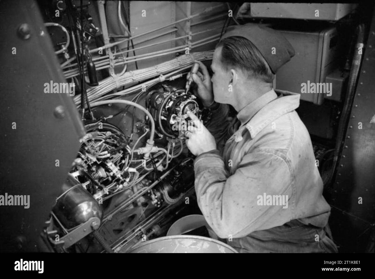 Royal Air Force Bomber Command, 1942-1945. An electrical fitter making ...