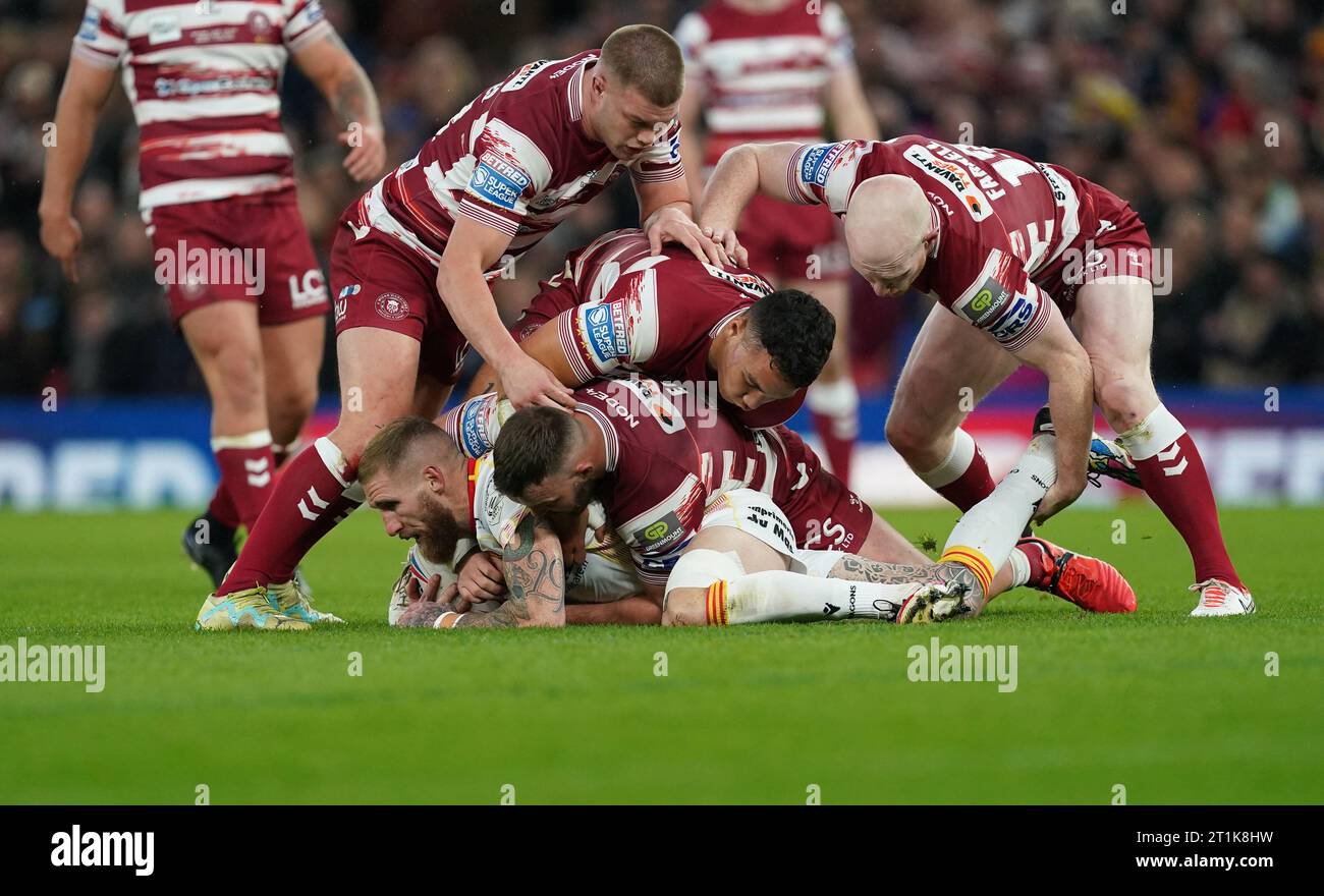 Catalans Dragons' Sam Tomkins is tackled down during the Betfred Super ...