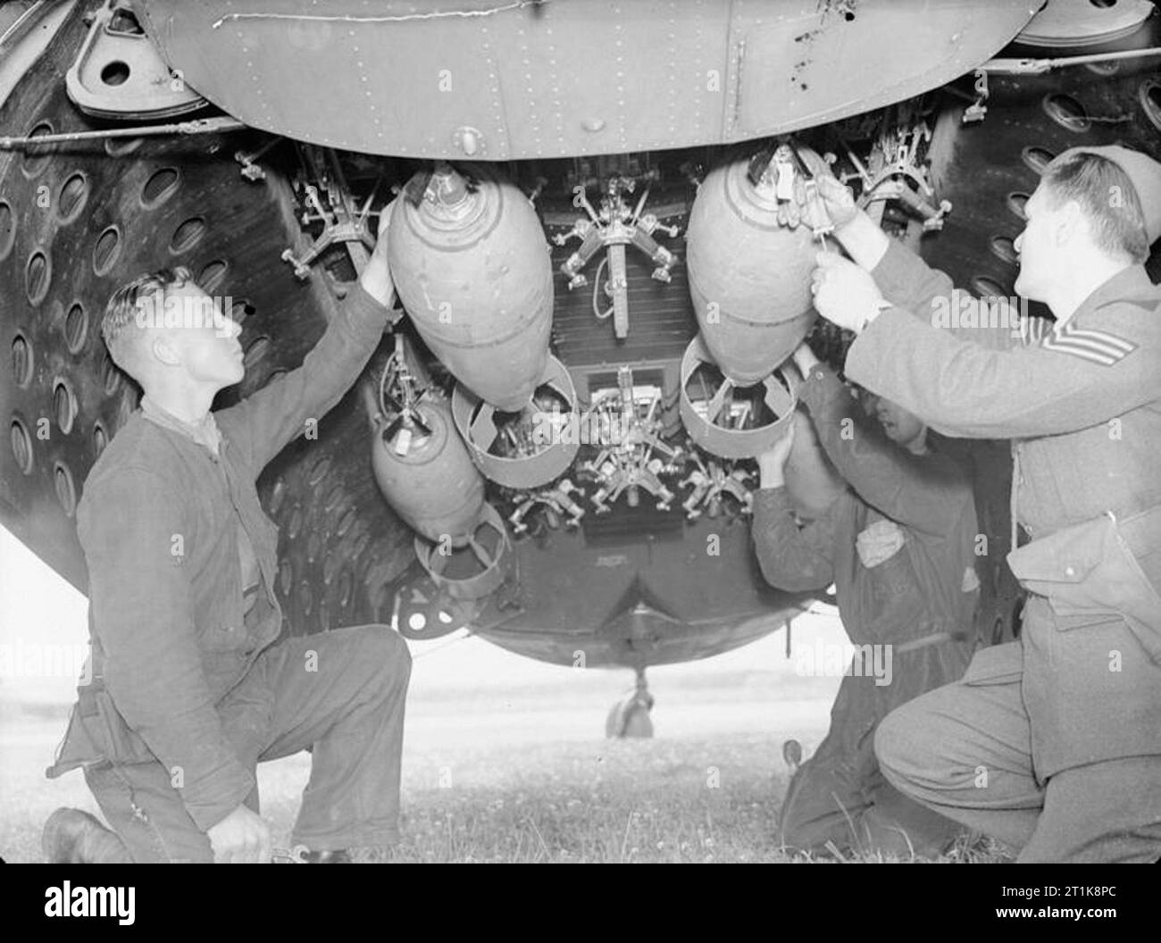 Royal Air Force Coastal Command, 1939-1945. Armourers secure 250-lb GP ...