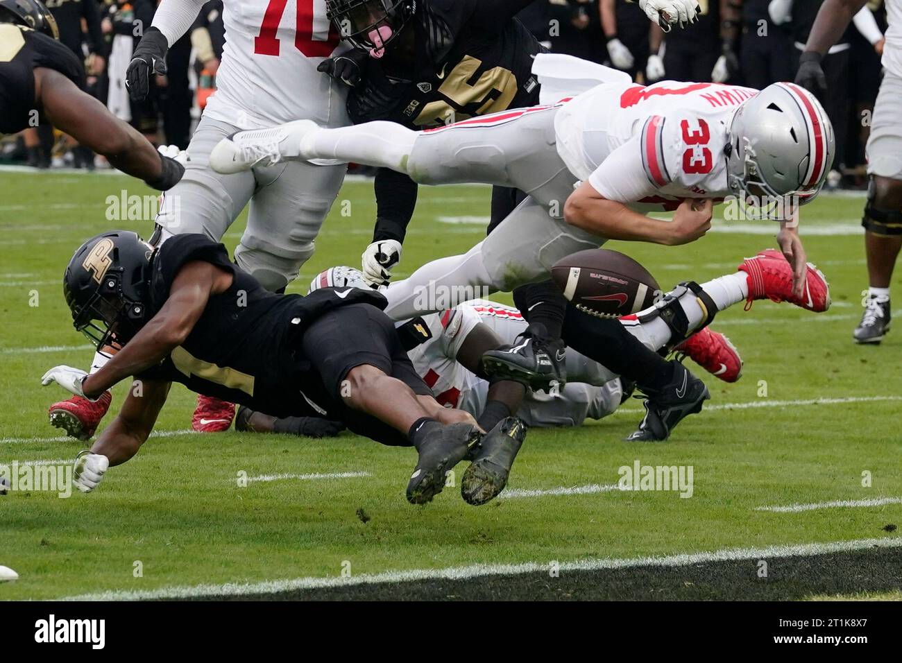 Ohio State quarterback Devin Brown (33) loses control of the football ...