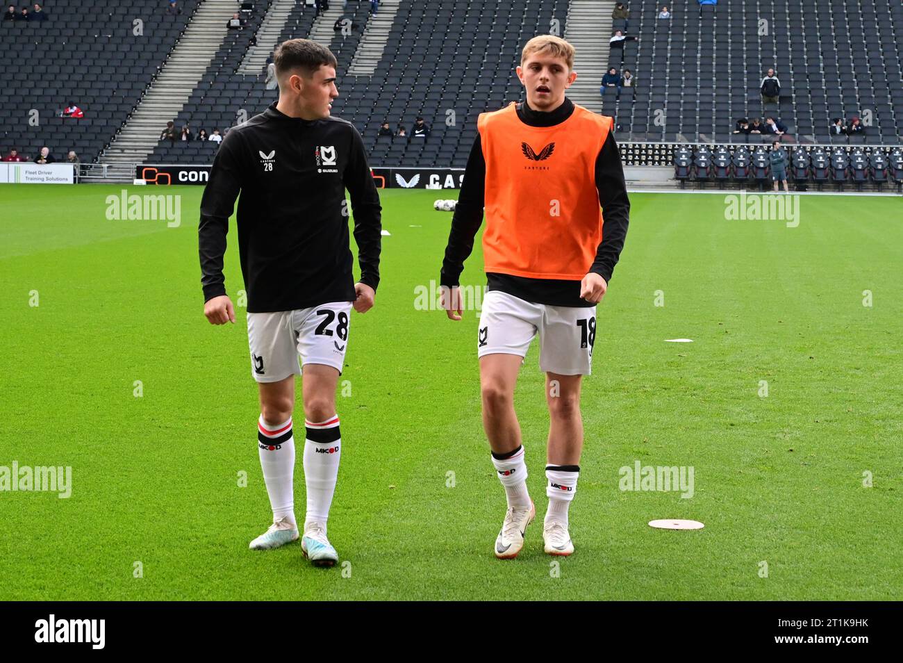 MK Dons football team warming up before the game on the 14th October ...