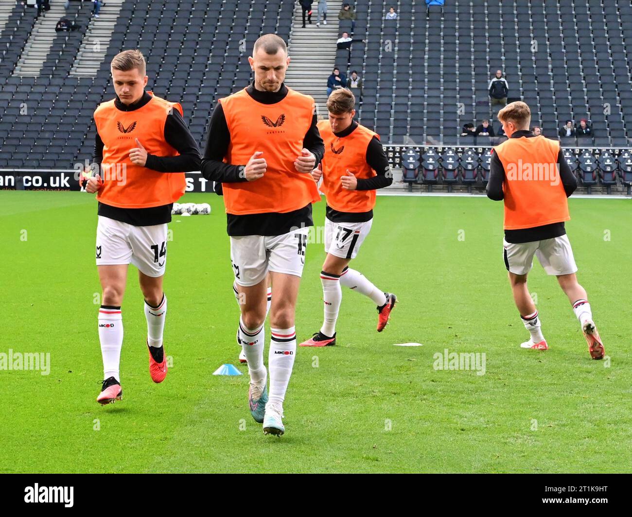 MK Dons football team warming up before the game on the 14th October ...