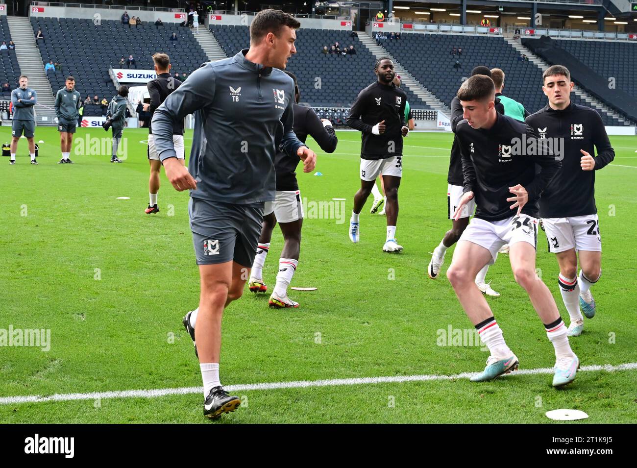 MK Dons football team warming up before the game on the 14th October ...