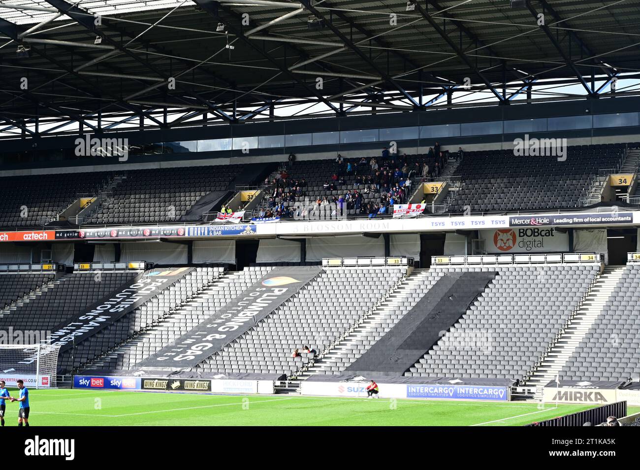 MK Dons football stadium seating Stock Photo - Alamy