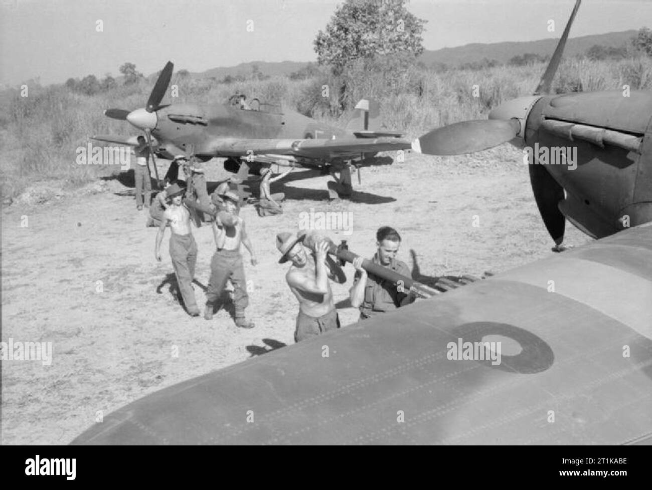 Royal Air Force Operations in the Far East, 1941-1945. Armourers fit ...