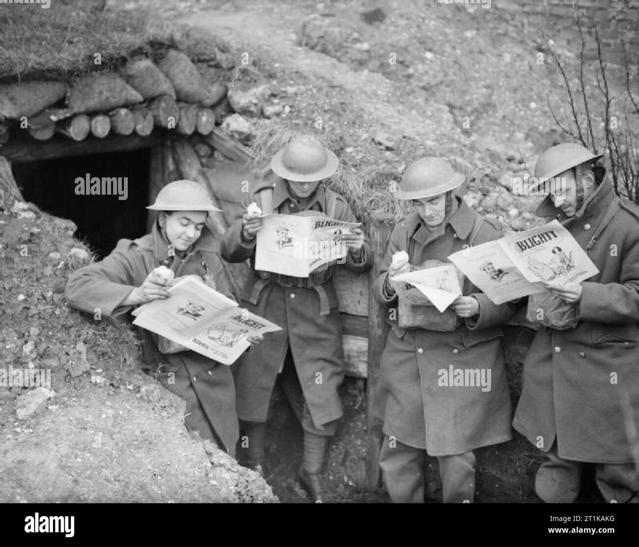 The British Army in France 1939-40 Troops reading copies of the Army ...