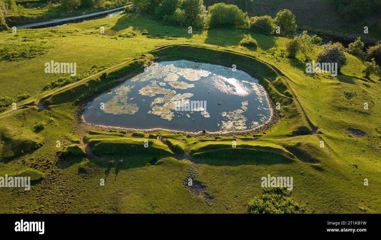 Lake and pond on the plateau. A lake in a green mountain landscape ...
