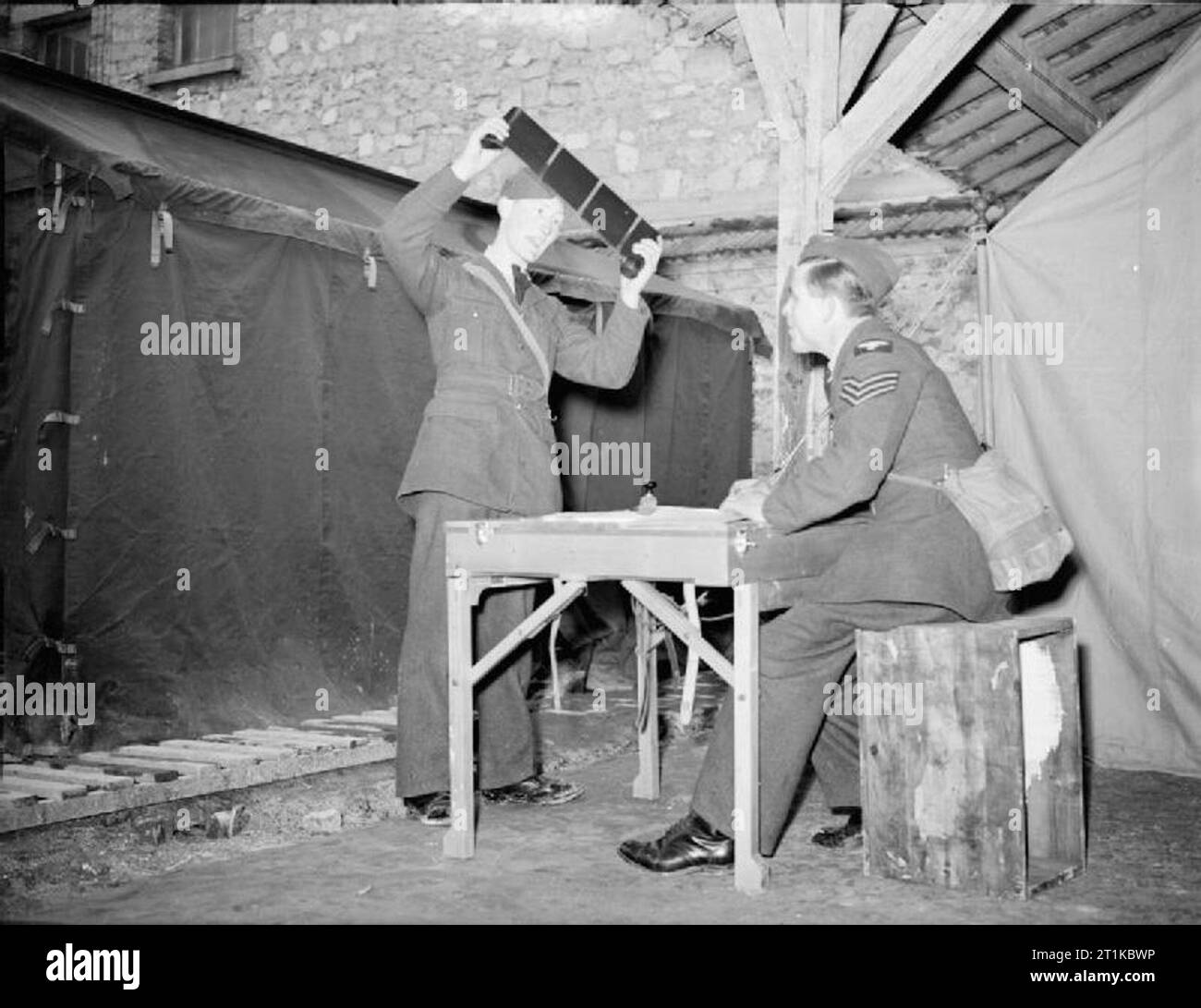 Royal Air Force- France, 1939-1940. A photographer shows developed film ...