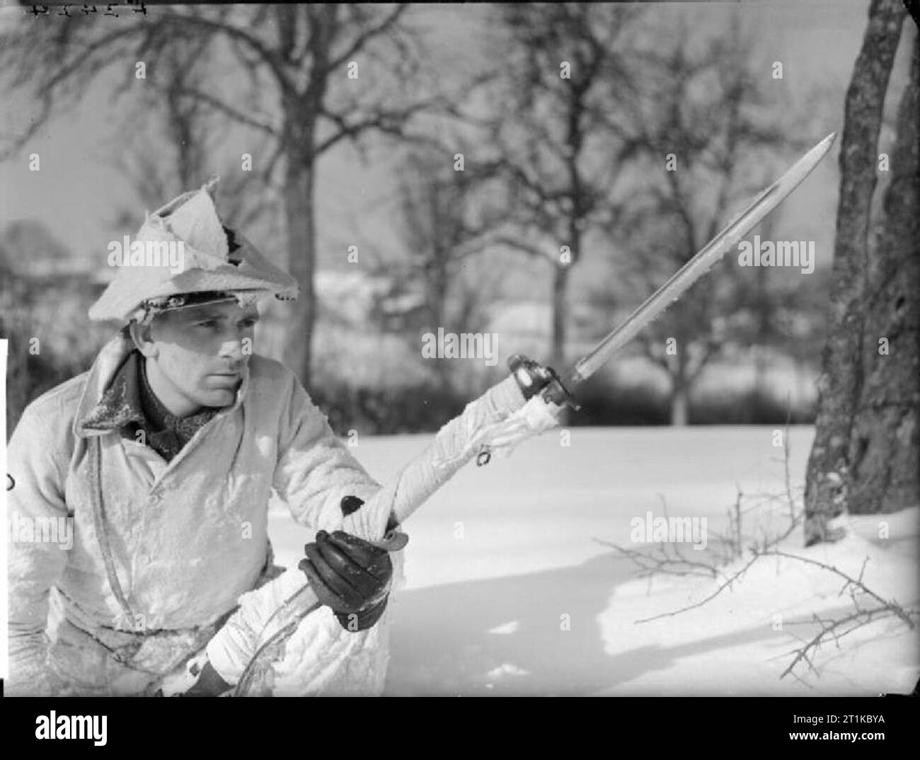 Soldier carrying rifle Black and White Stock Photos & Images - Alamy