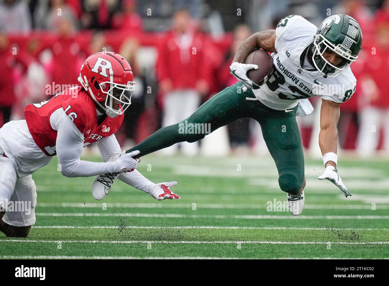 Michigan State wide receiver Montorie Foster Jr. (83) is tackled by ...